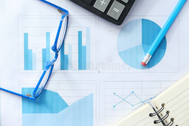 Financial Graph, Calculator and Notepad on Table Stock Image - Image of ...