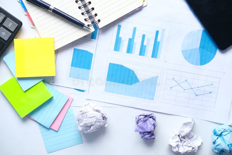 Financial Graph, Calculator and Notepad on Table Stock Image - Image of ...