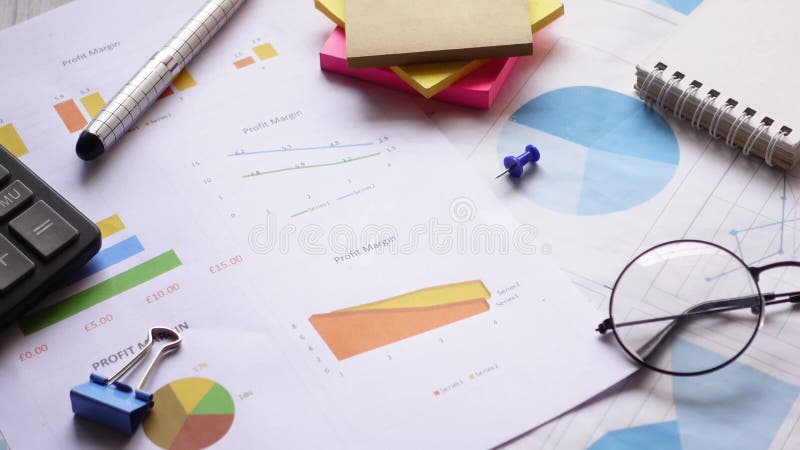 Financial Graph, Calculator and Notepad on Table Stock Footage - Video ...