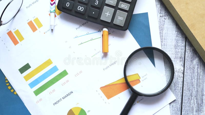Financial Graph, Calculator and Notepad on Table Stock Video - Video of ...