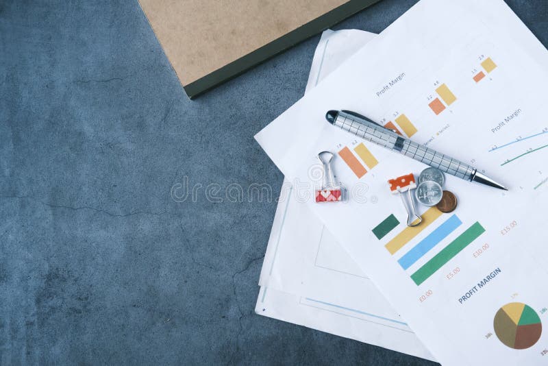 Financial Graph, Calculator and Notepad on Table with Copy Space Stock ...