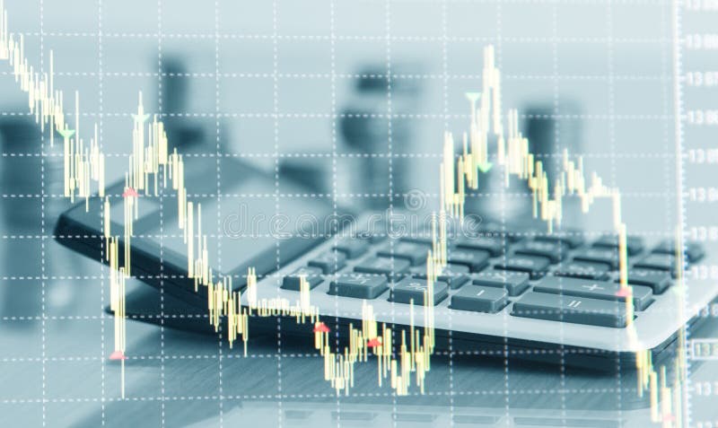 Financial Graph Chart and Rows of Coins with Calculator Stock Photo ...