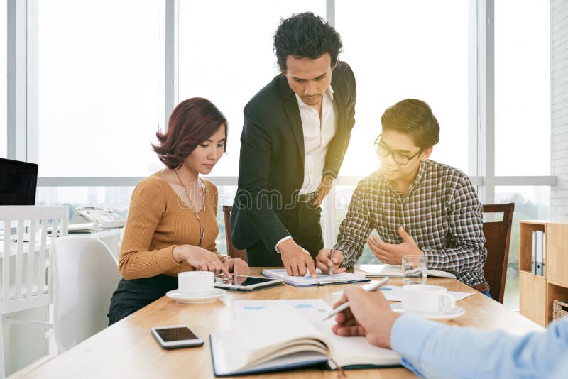 Discussing report stock photo. Image of financial, report - 102150068