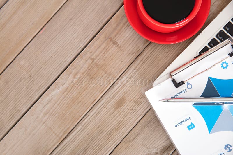 Financial Materials and a Cup of Coffee and Computer on the Table Stock ...