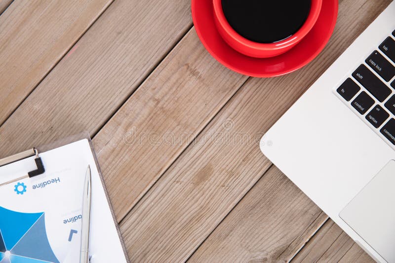 Financial Materials and a Cup of Coffee and Computer on the Table Stock ...