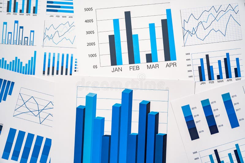 Financial Paper with Charts and Diagrams on Gray Table Stock Photo ...