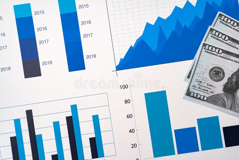 Financial Paper with Charts and Diagrams on Gray Table Stock Photo ...