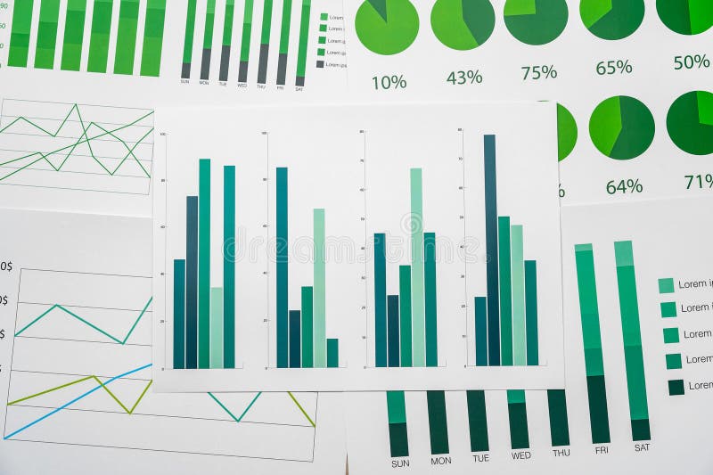 Financial Paper with Charts and Diagrams on Gray Table Stock Photo ...