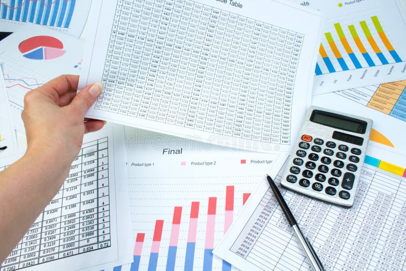 Financial Printed Paper Charts, Graphs and Diagrams on the Table. Top ...