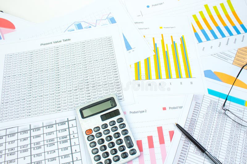Financial Printed Paper Charts, Graphs and Diagrams on the Table. Top ...