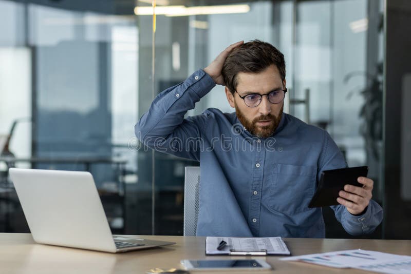 Financial Problems with Accounts. Young Bored Man Sitting in the Office ...