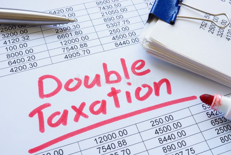 Financial Report with a Note about Double Taxation. Stock Photo - Image ...