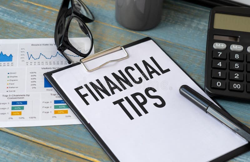 FINANCIAL TIPS Text on a Notebook with Pen and Chart. Stock Image ...