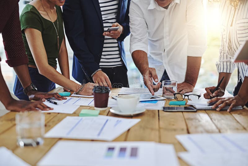 We Find Issues and Solutions Together As a Team. a Group of ...