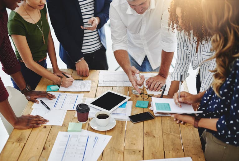 We Find Issues and Solutions Together As a Team. a Group of ...