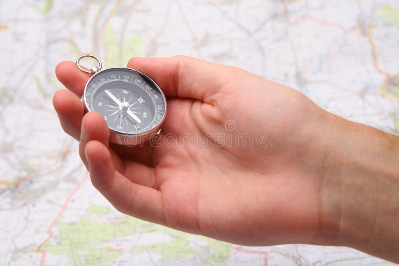 Finger on a map stock photo. Image of close, compass, yellow - 144610