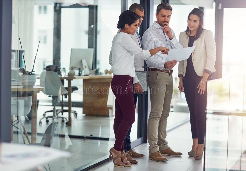 Finding Business Solutions As a Team. a Group of Coworkers Talking Over ...