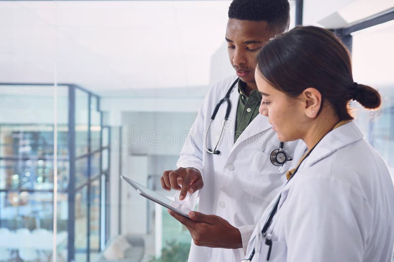 Finding the Most Effective Treatment, Together. Two Young Doctors ...