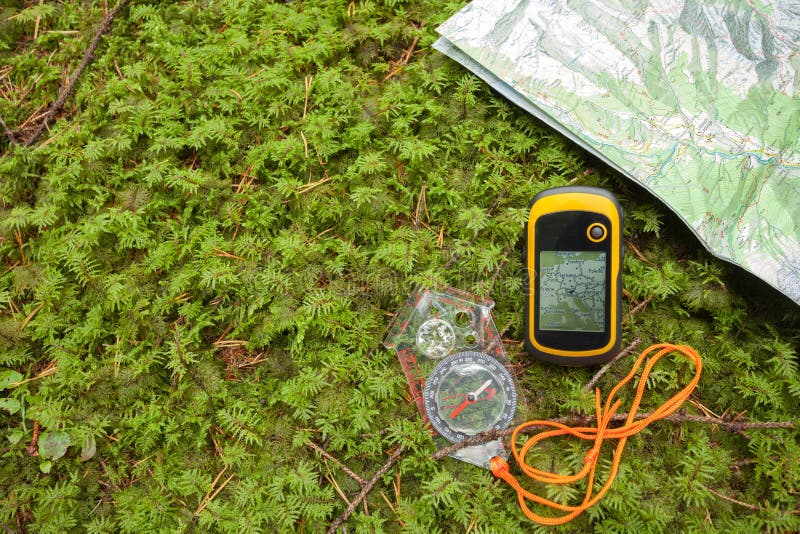 Finding The Right Position In The Forest With A Compass Map An Stock Image Image Of Forest