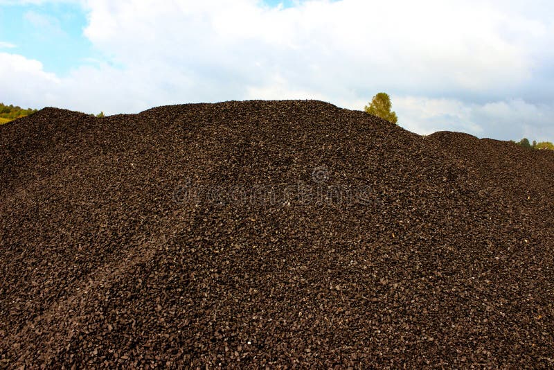 Fine Charcoal for Heating is Dumped in a Big Pile Stock Photo - Image ...