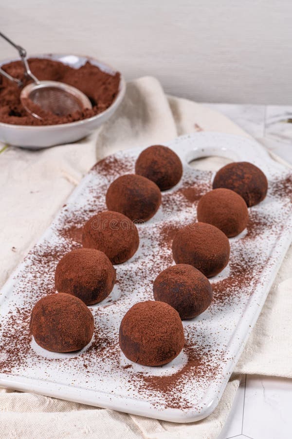 Fine Chocolate Truffles on White Ceramic Plate Stock Image - Image of ...