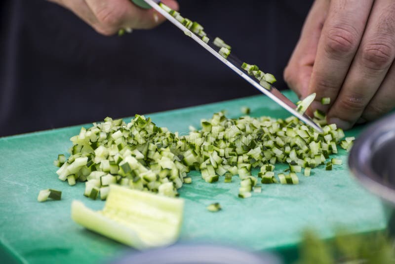Fine chopped cucumber stock photo. Image of male, cutting - 98581604