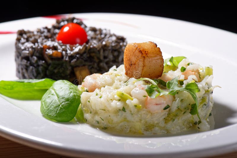 Fine Dining, Black Risotto with Squid Ink and Seafood Risotto Stock ...