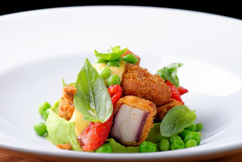 Fine Dining, Fried Octopus on Basil Mousse, Green Peas Stock Image ...