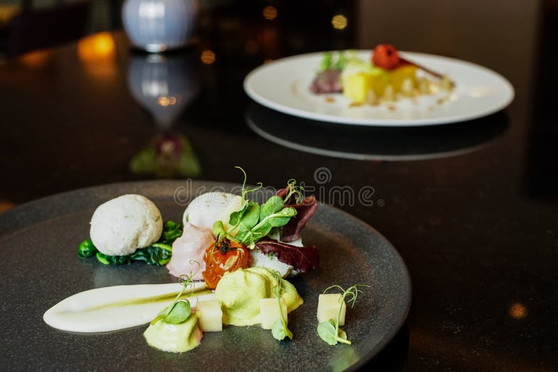 Fine dining plate closeup stock photo. Image of cuisine - 104601052
