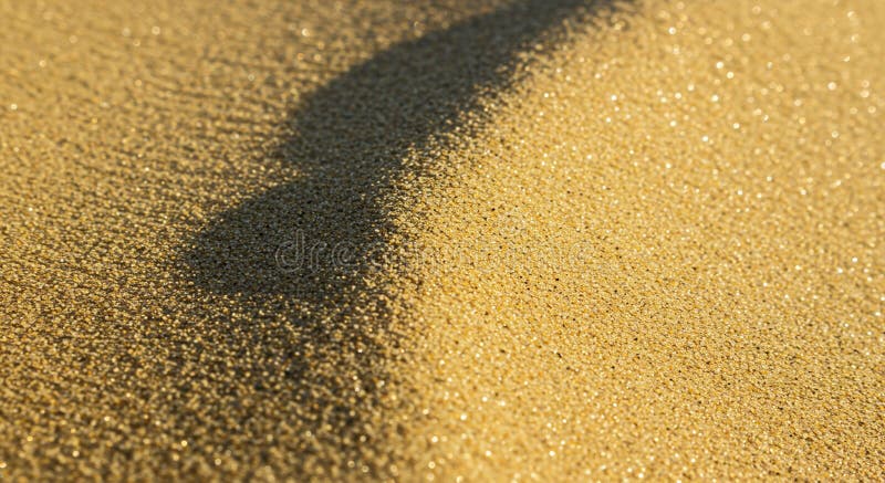 Fine Grains of Golden Sand Create a Smooth, Undulating Surface with a ...