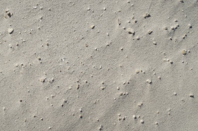 Fine gray sand closeup stock photo. Image of pebbles - 193612776