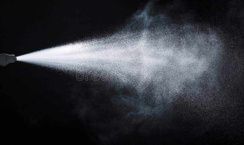 Fine Mist Spray in Motion Against Dark Background Stock Image - Image ...