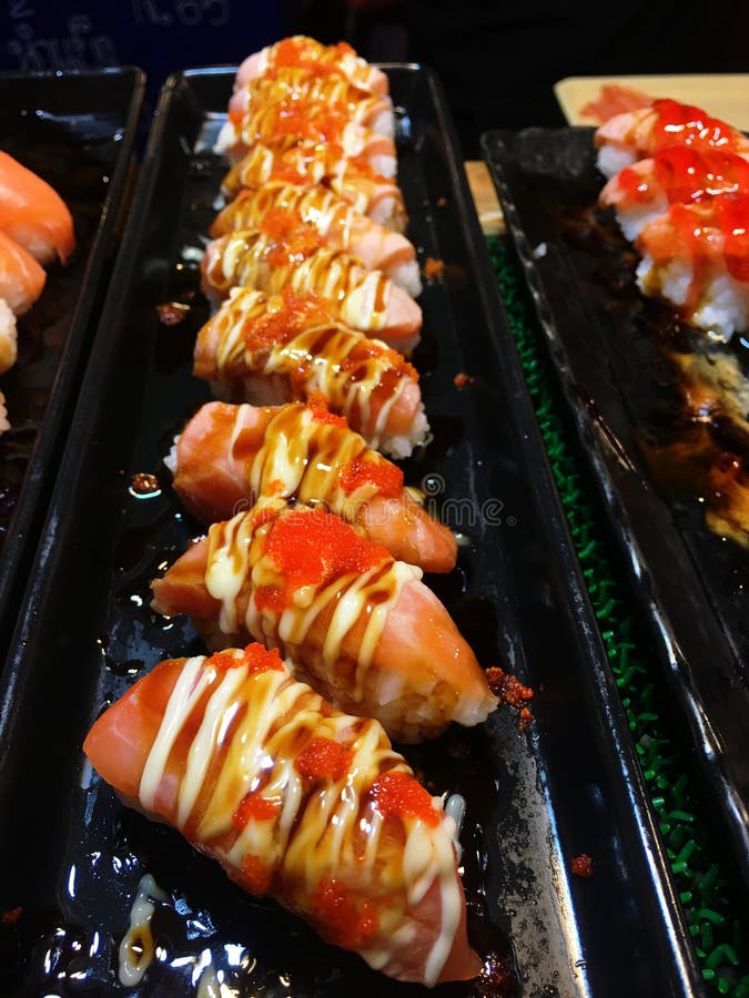 Fine Nigiril Salmon Aburi Sushi Stock Photo - Image of fine, sauce ...