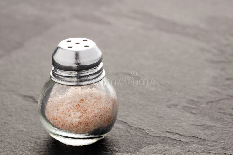 Fine Salt in a Glass Salt Shaker - Pink Himalayan Salt Stock Photo ...
