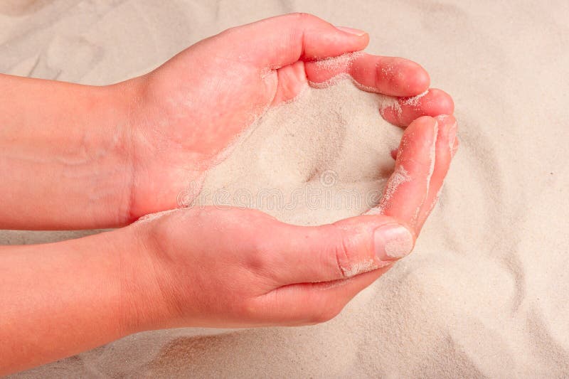 Fine Sand Flowing Out of Womens Hands Stock Image - Image of mineral ...