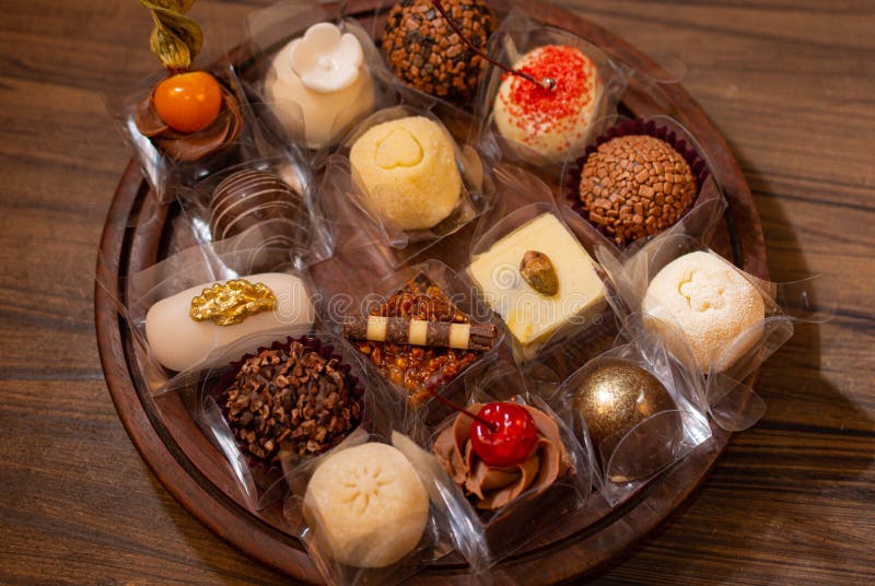 Fine Sweets for Parties with Chocolate Lemon Cherry and Physalis ...