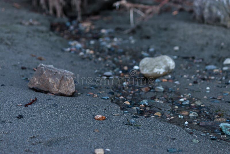 Fine Wet Sand with Pebles in a Trickle of Water Stock Image - Image of ...
