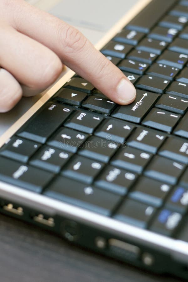 Finger on enter key stock photo. Image of detailed, details - 7403546