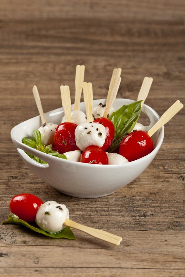 Finger food. Mini caprese. stock photo. Image of mini - 48084320