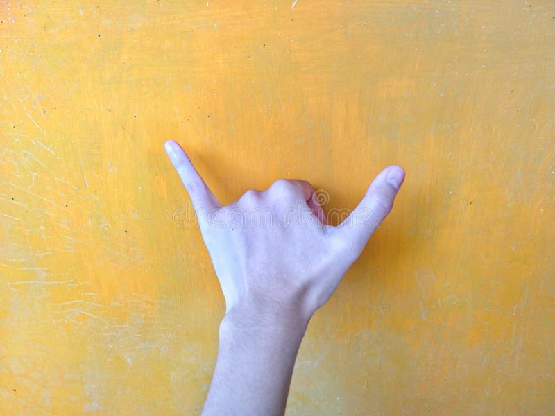 Finger Gesture Asian Woman with Yellow Background. Stock Photo - Image ...