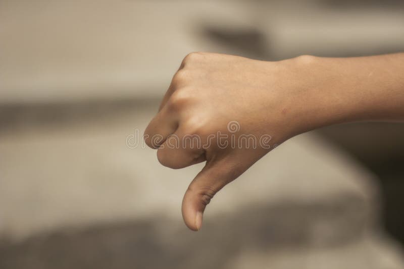 A Finger of a Hand is Pressed Down and the Background is Blurred Stock ...