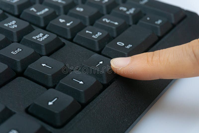 Finger Holding Computer Keyboard Stock Photo - Image of concepts, brand ...