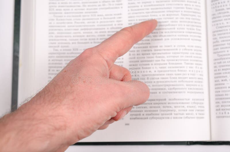 Finger hows an open book. stock photo. Image of gesture - 51040252