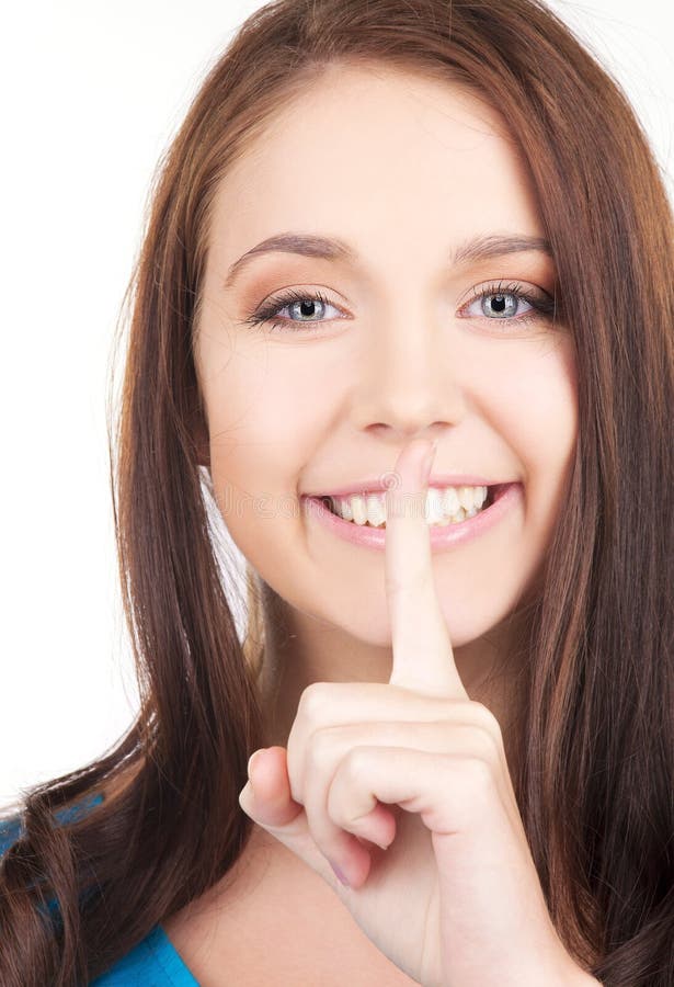 Finger on lips stock photo. Image of cunning, enigmatic - 12217760