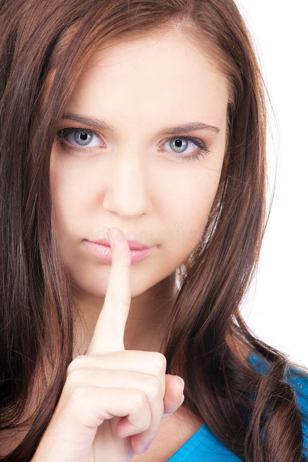 Finger on lips stock photo. Image of cunning, enigmatic - 12217760