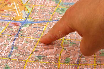 Finger on a map stock photo. Image of close, compass, yellow - 144610