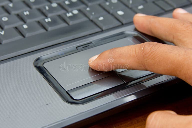Finger on Notebook Touchpad. Stock Photo - Image of portable, computer ...