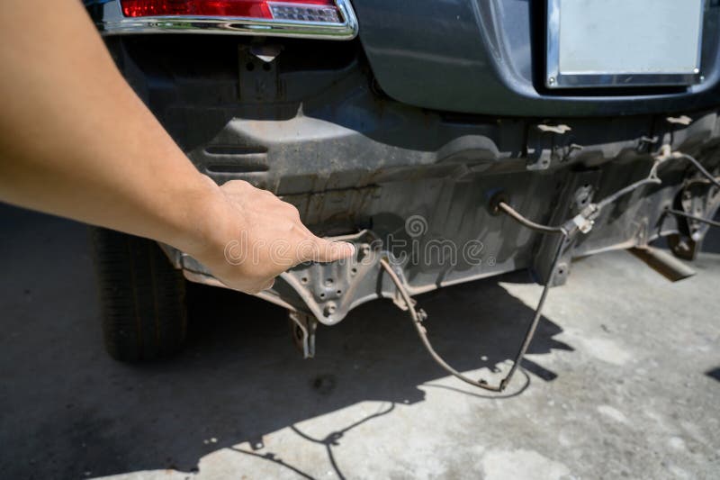 Finger Pointing at a Damage on the Back Side Car. Stock Photo - Image ...