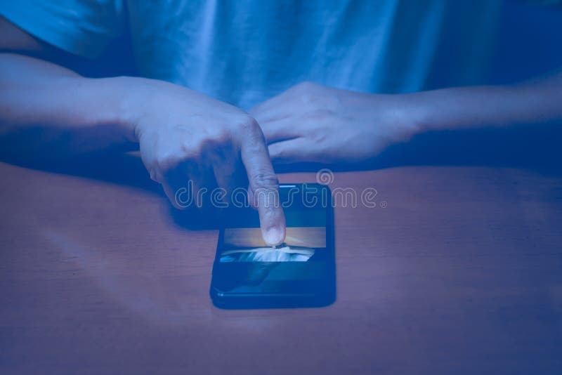 Finger Pointing on Mobile Phone Touch Screen in Blue Tone. Stock Photo ...
