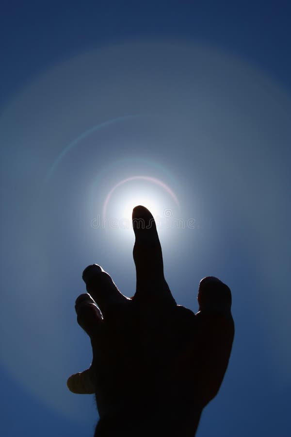Finger pointing at sun stock photo. Image of star, abstract - 30498716